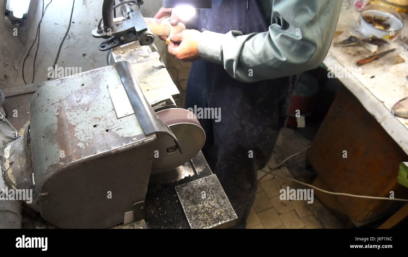Slow motion shoemaker making sole hi-res stock photography and images ...
