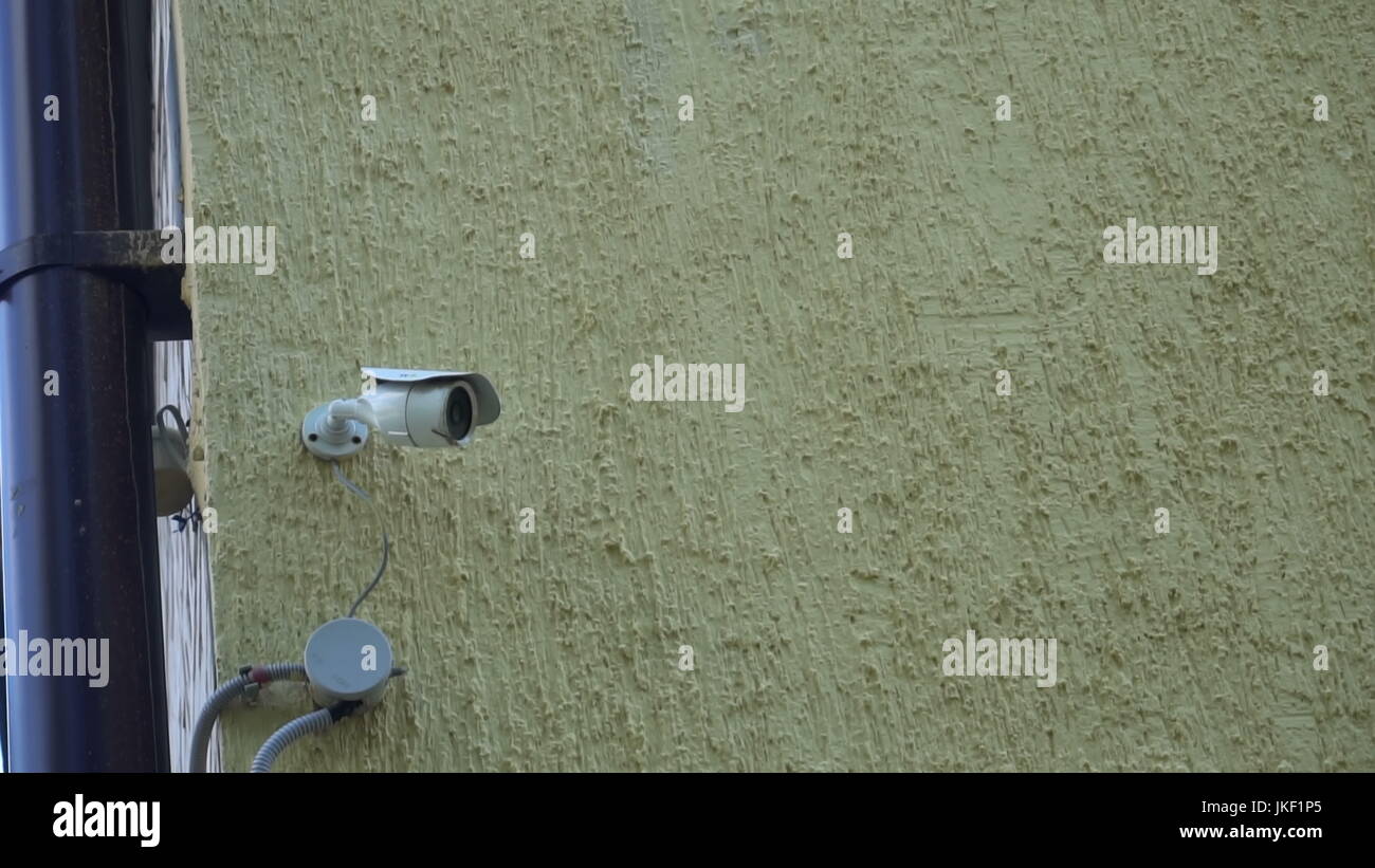 surveillance camera on the wall of children's art school Stock Photo ...
