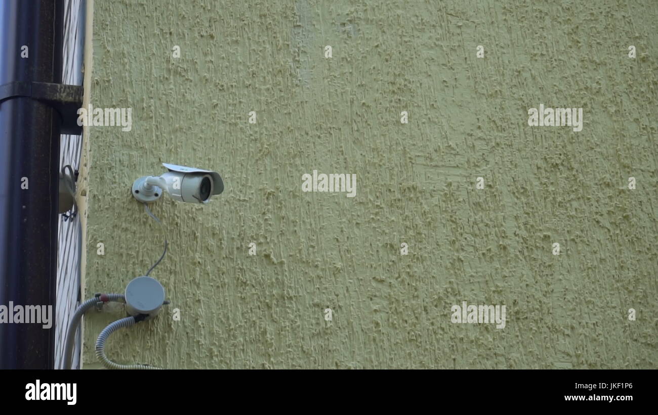 surveillance camera on the wall of children's art school Stock Photo ...