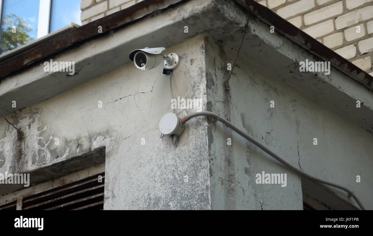 surveillance camera on the wall of children's art school Stock Photo ...