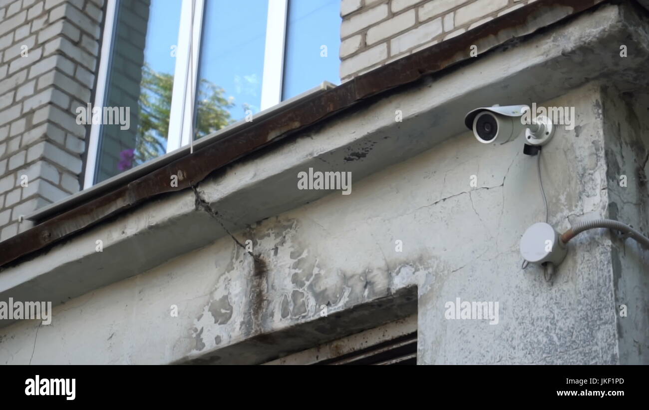 surveillance camera on the wall of children's art school Stock Photo ...