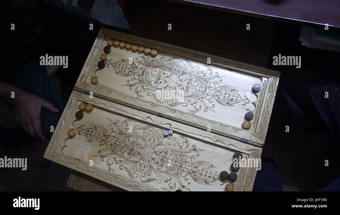 men playing backgammon,wooden Board,roll the dice Stock Photo - Alamy