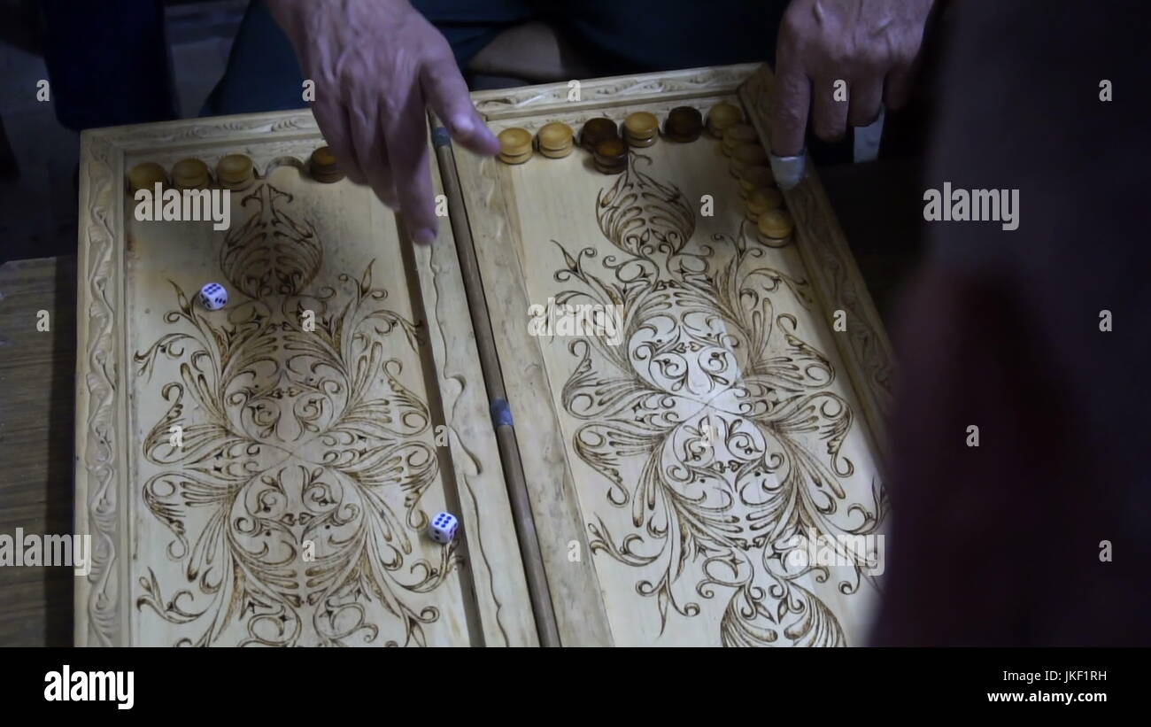 men playing backgammon,wooden Board,roll the dice Stock Photo - Alamy