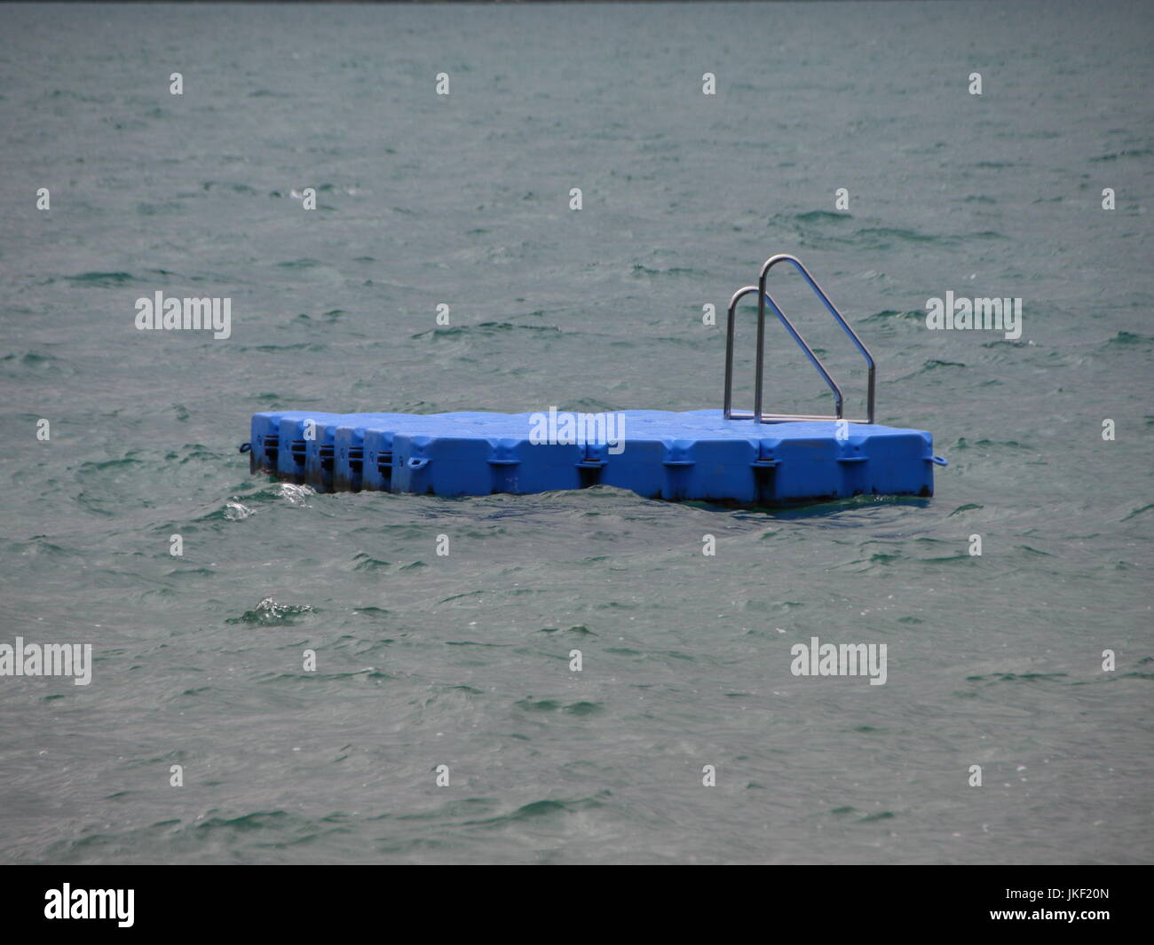 Isolated Blue Ponton Swimming Platform on Stormy Cold Water Stock Photo ...