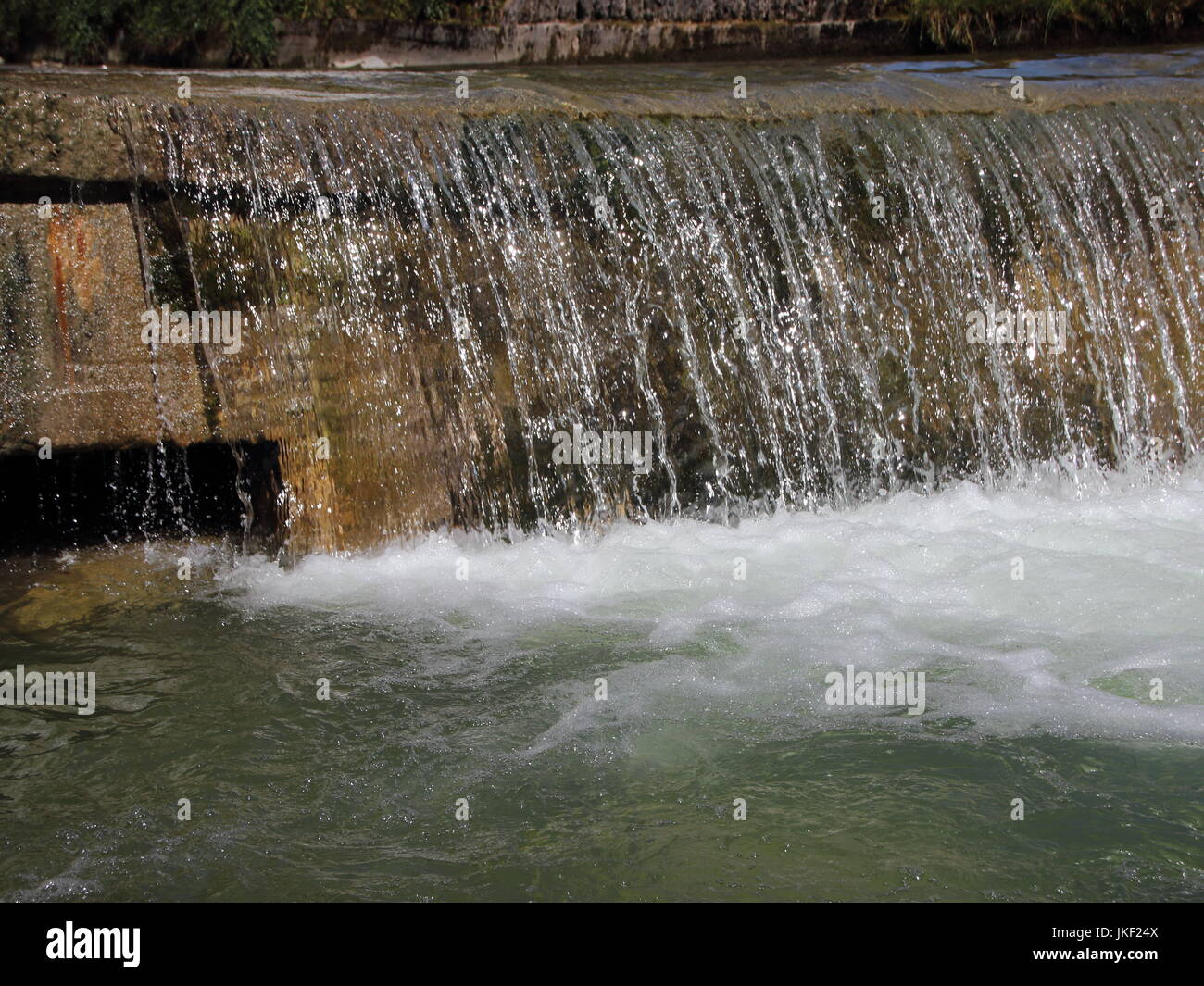 Waterfall in Drain Canal with Melting Water from Mountains Stock Photo ...
