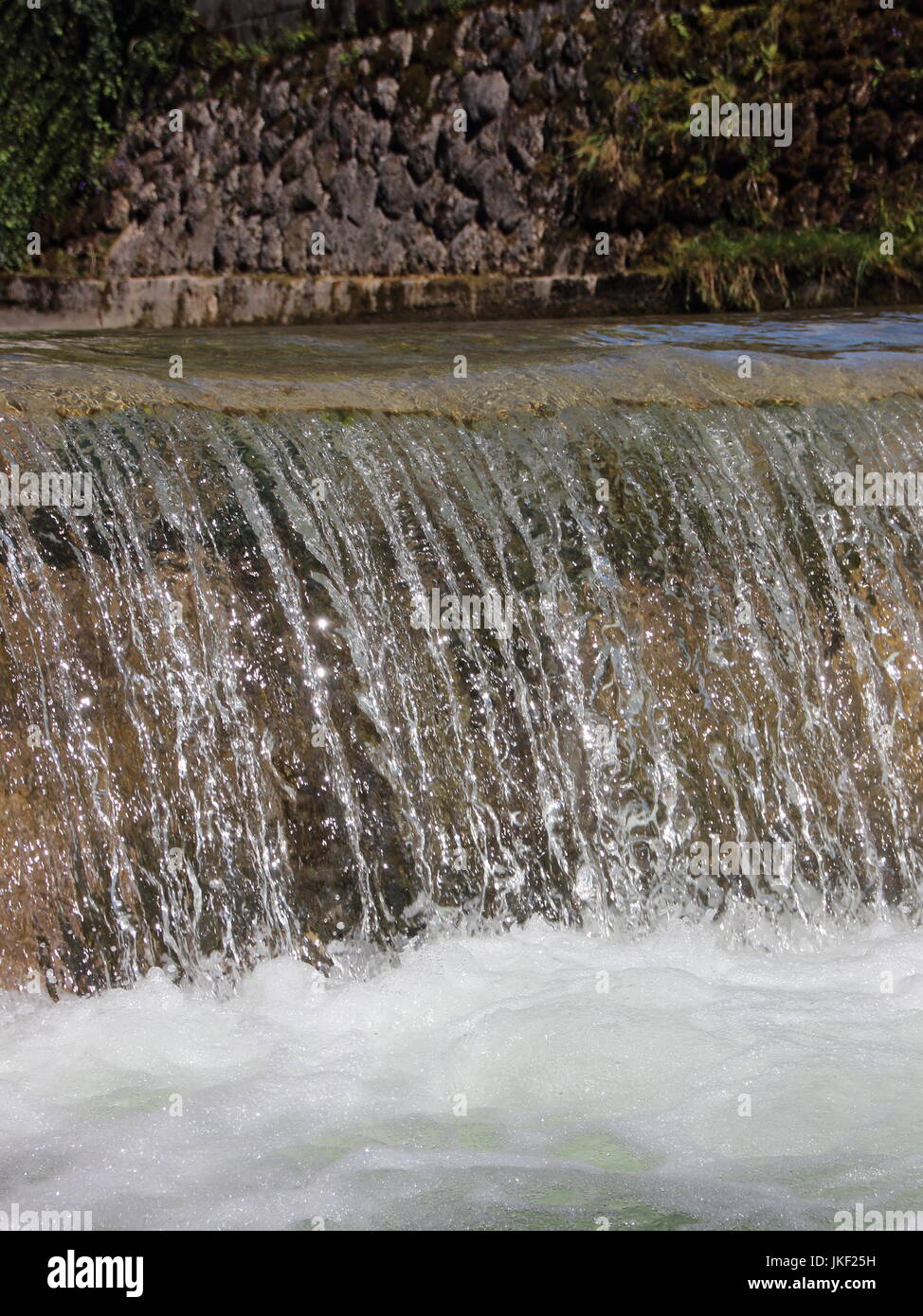 Waterfall in Drain Canal with Melting Water from Mountains Stock Photo ...