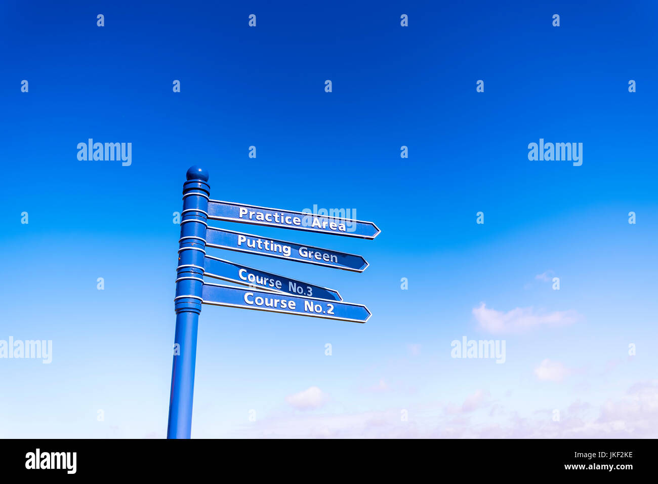 Golf courses direction sign Stock Photo - Alamy