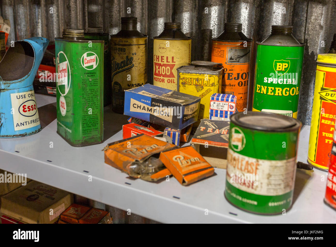 A selection of vintage motoring oils and spark plugs in the Haynes ...