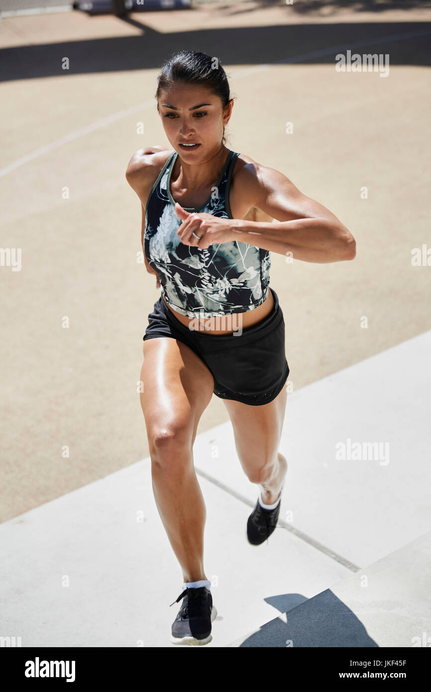 Fit woman running outdoors Stock Photo - Alamy