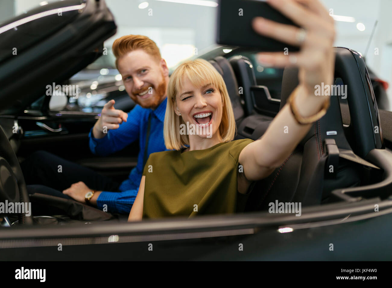 Man car dealership taking selfie hi-res stock photography and images ...