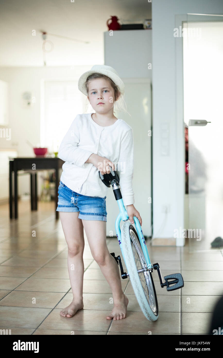 Child unicycle hi-res stock photography and images - Alamy