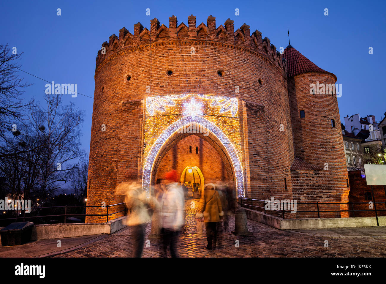 Poland, Warsaw, gate to the Old Town through Barbican fortified outpost ...