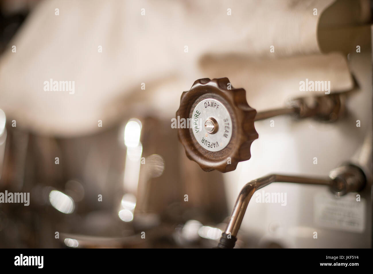Old espresso coffee maker steam valve knob selector Stock Photo - Alamy