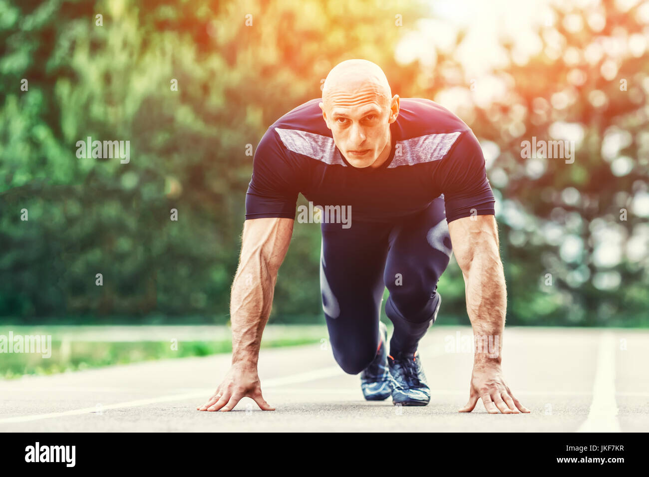 Crouched position hi-res stock photography and images - Alamy