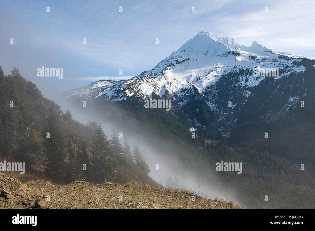 Fog rolling over the pass near snow capped Mt Hood Stock Photo - Alamy