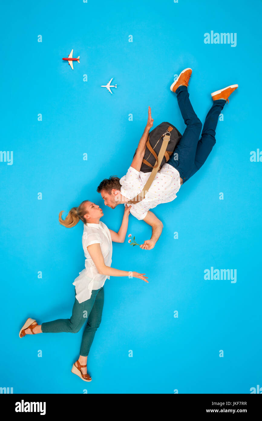 Happy couple reuniting after man coming back from journey Stock Photo ...