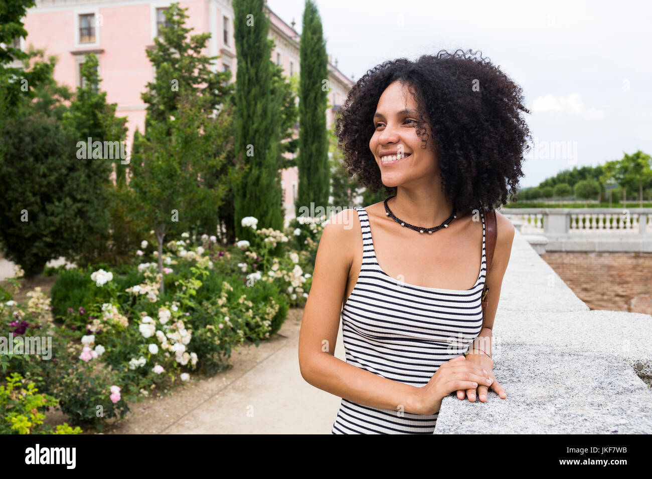 Woman leaning shoulder against building hi-res stock photography and ...