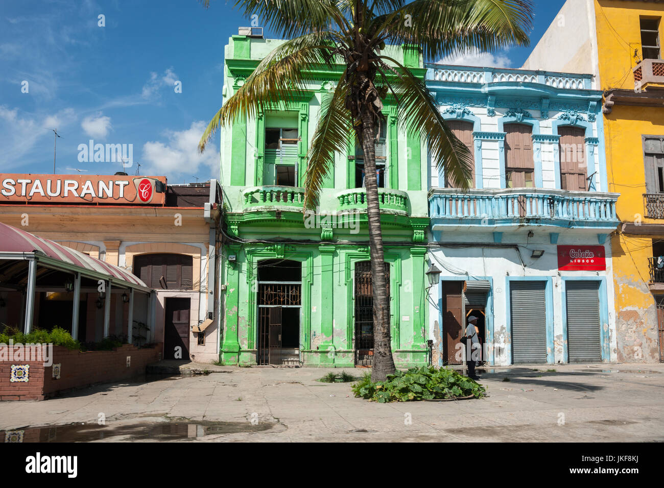 Neo-classical style architecture in neglected state and bright colors ...
