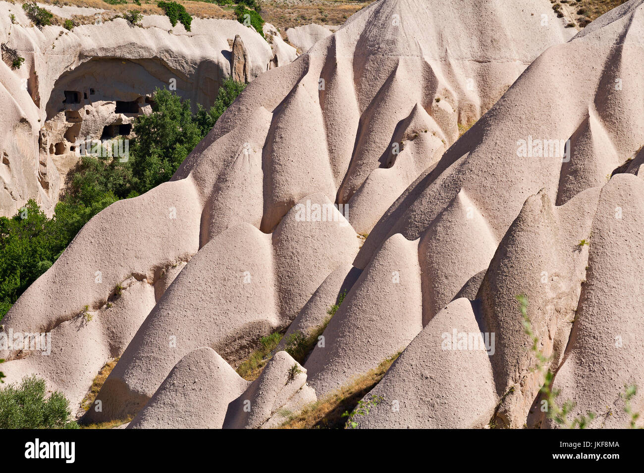 Volcanic rock formations known as fairy chimneys and extreme terrain of ...