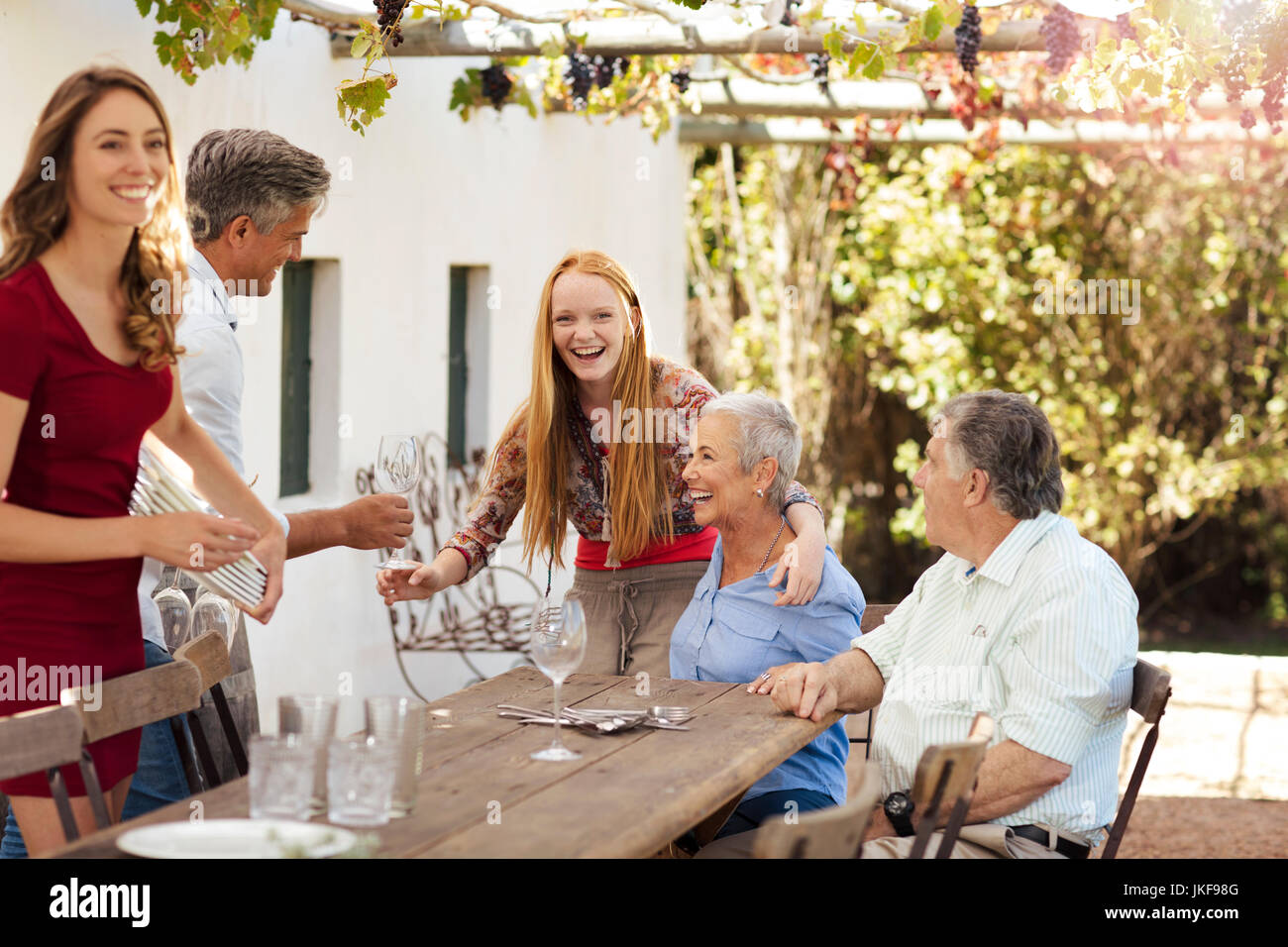Family lunch outside generations table hi-res stock photography and ...
