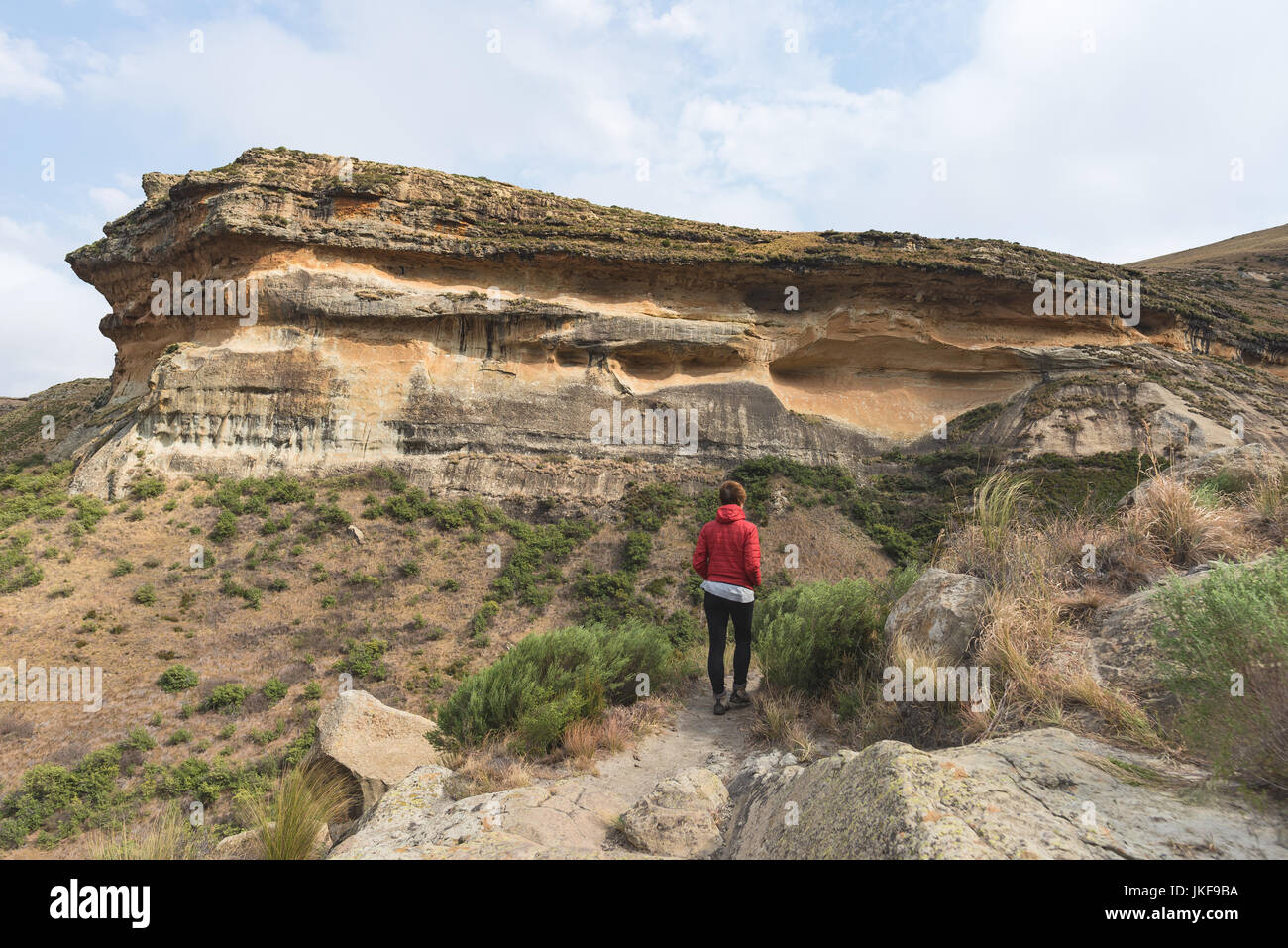 Tourist trekking on marked trail in the Golden Gate Highlands National ...