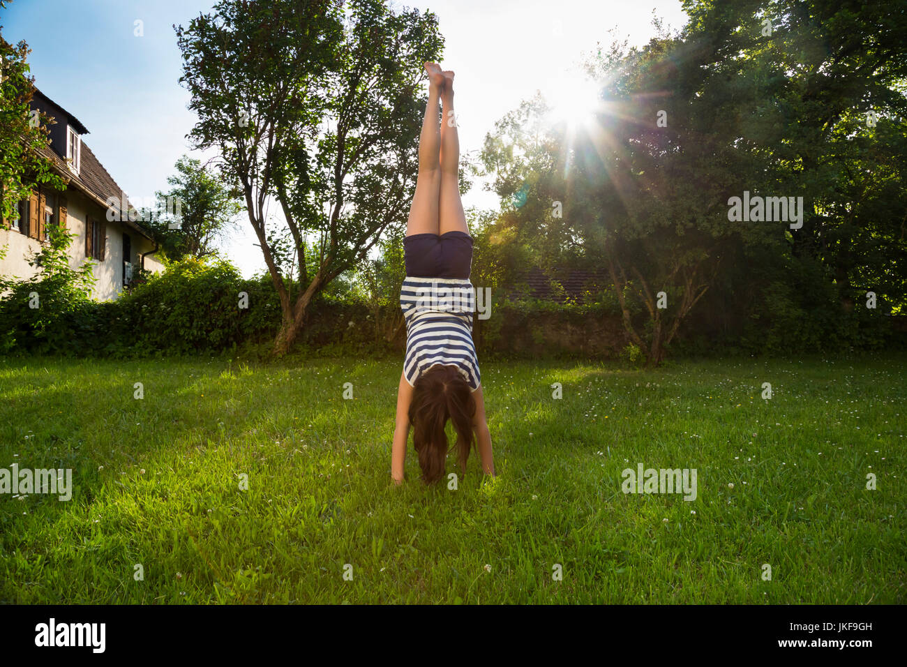 Girl Doing Handstand High Resolution Stock Photography and Images - Alamy
