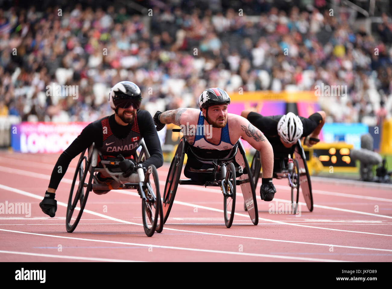 Mickey Bushell silver in the 100m T53 wheelchair behind Brent Lakatos ...