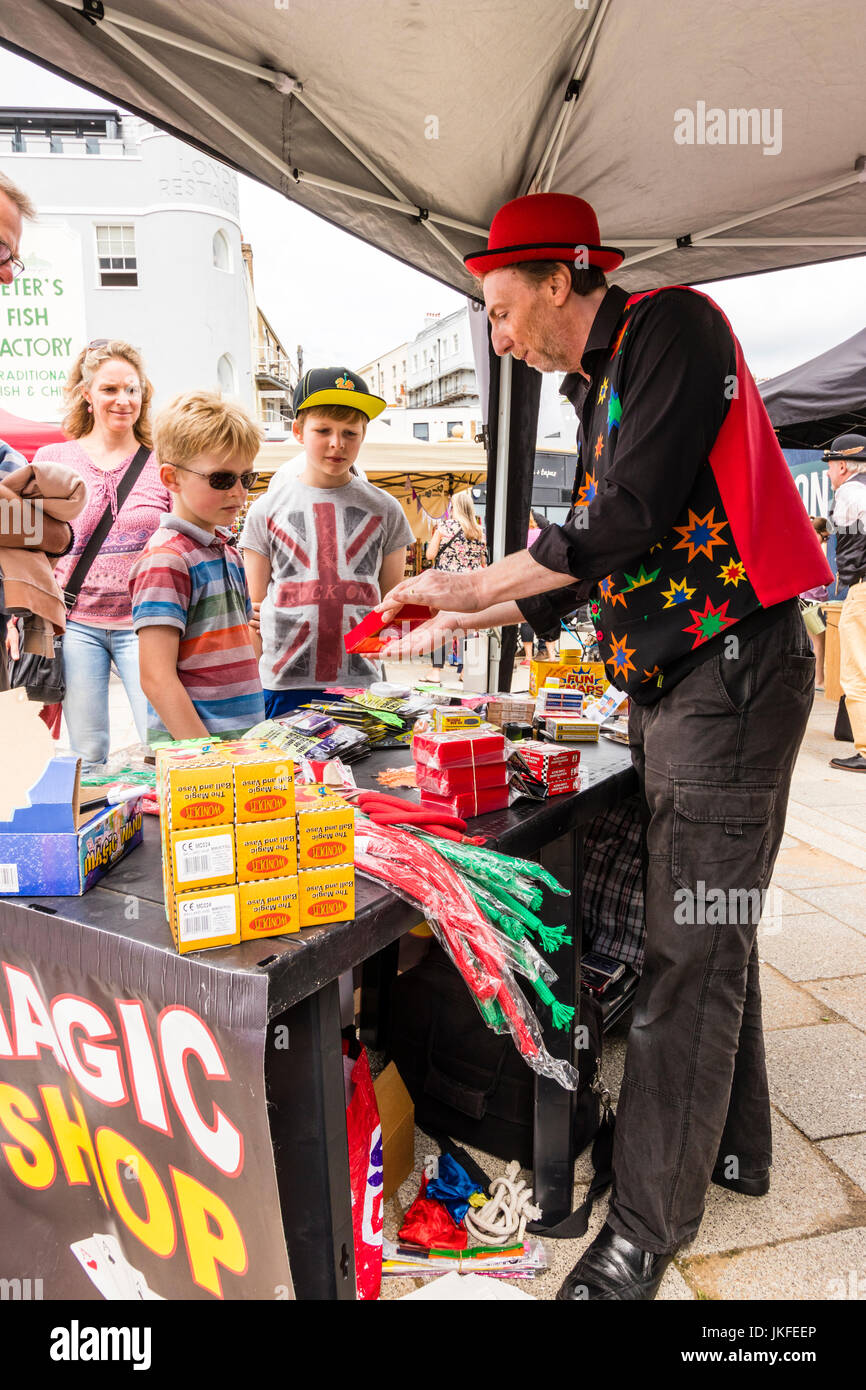 Open market stall with magic tricks on. Zenea, local magician ...
