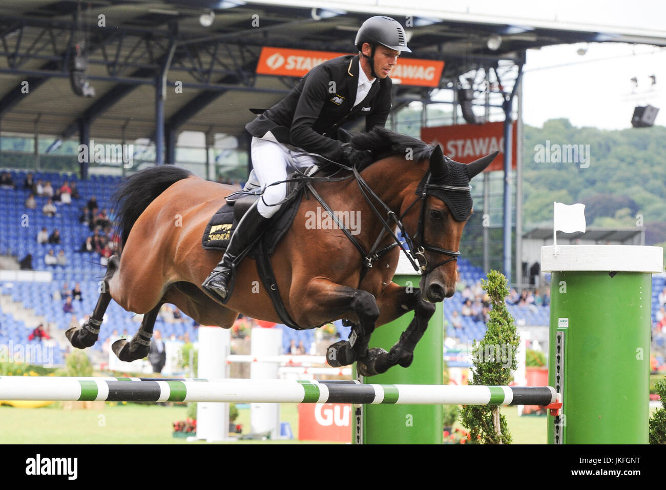 Aachen, Germany. 23rd July, 2017. Showjumper Marko Kutscher on horse ...