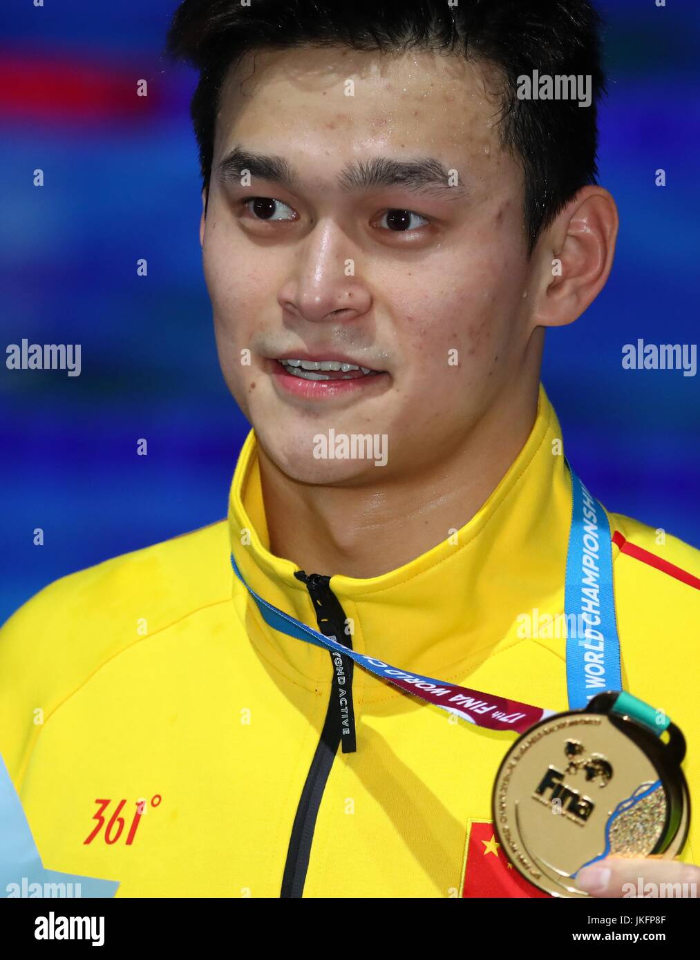 Budapest. 23rd July, 2017. China's Sun Yang shows his gold medal after ...