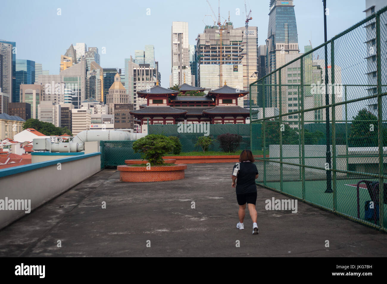 Woman jogging in city centre hi-res stock photography and images - Alamy