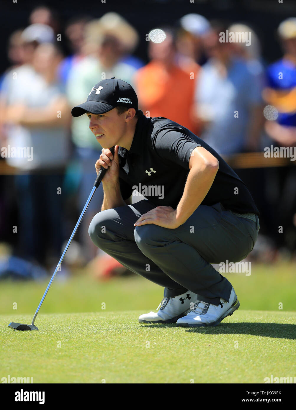 England's Matthew Fitzpatrick lines up a putt on the 4th during day ...