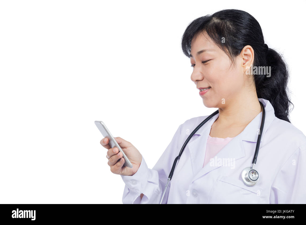 Asian female doctor using mobile phone in isolated White Background ...