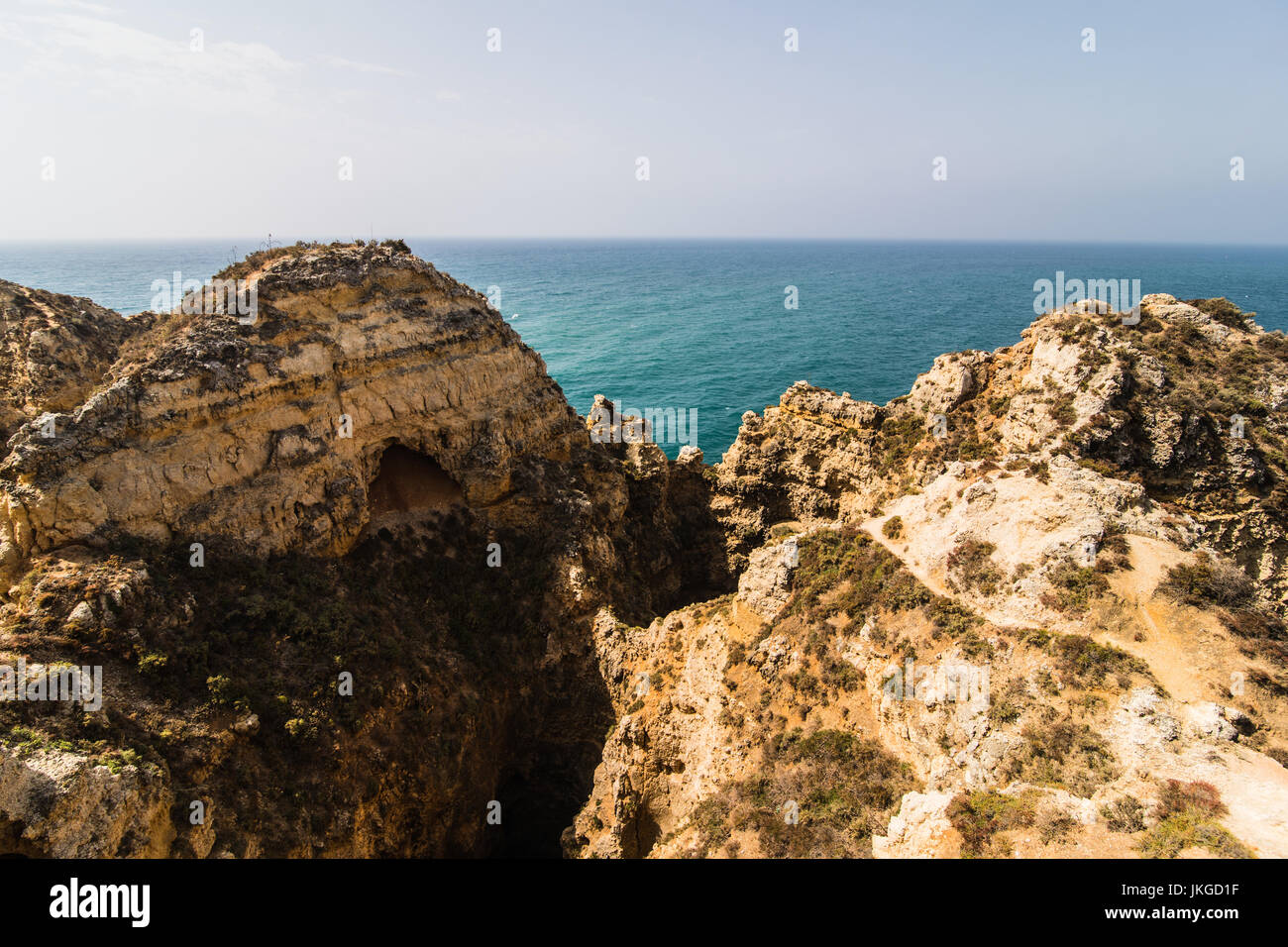 Beautiful sandstone rock formation with a cave Stock Photo - Alamy