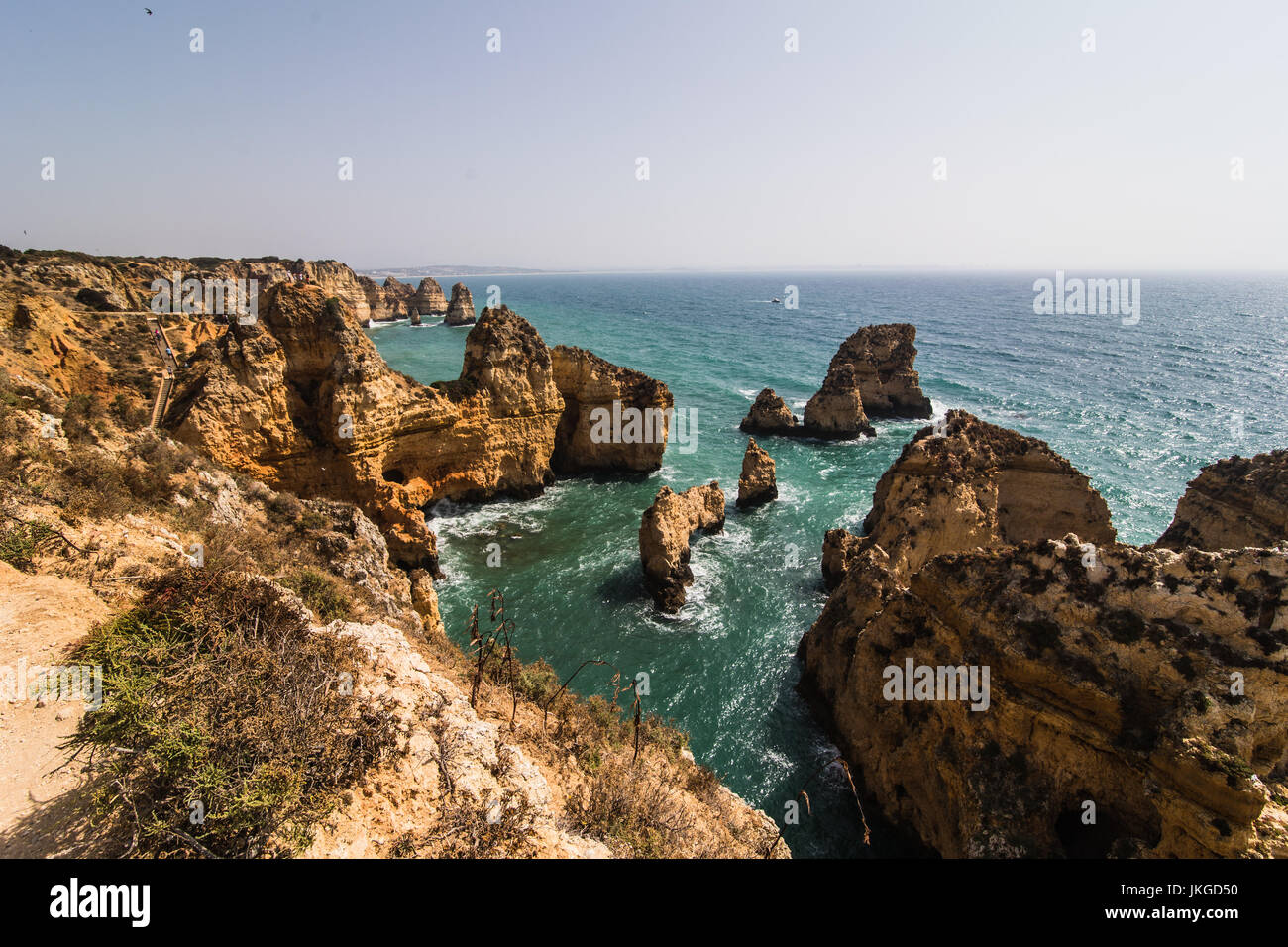 Beautiful atlantic ocean view horizon with sandy beach rocks and waves. Summer vocation Stock ...