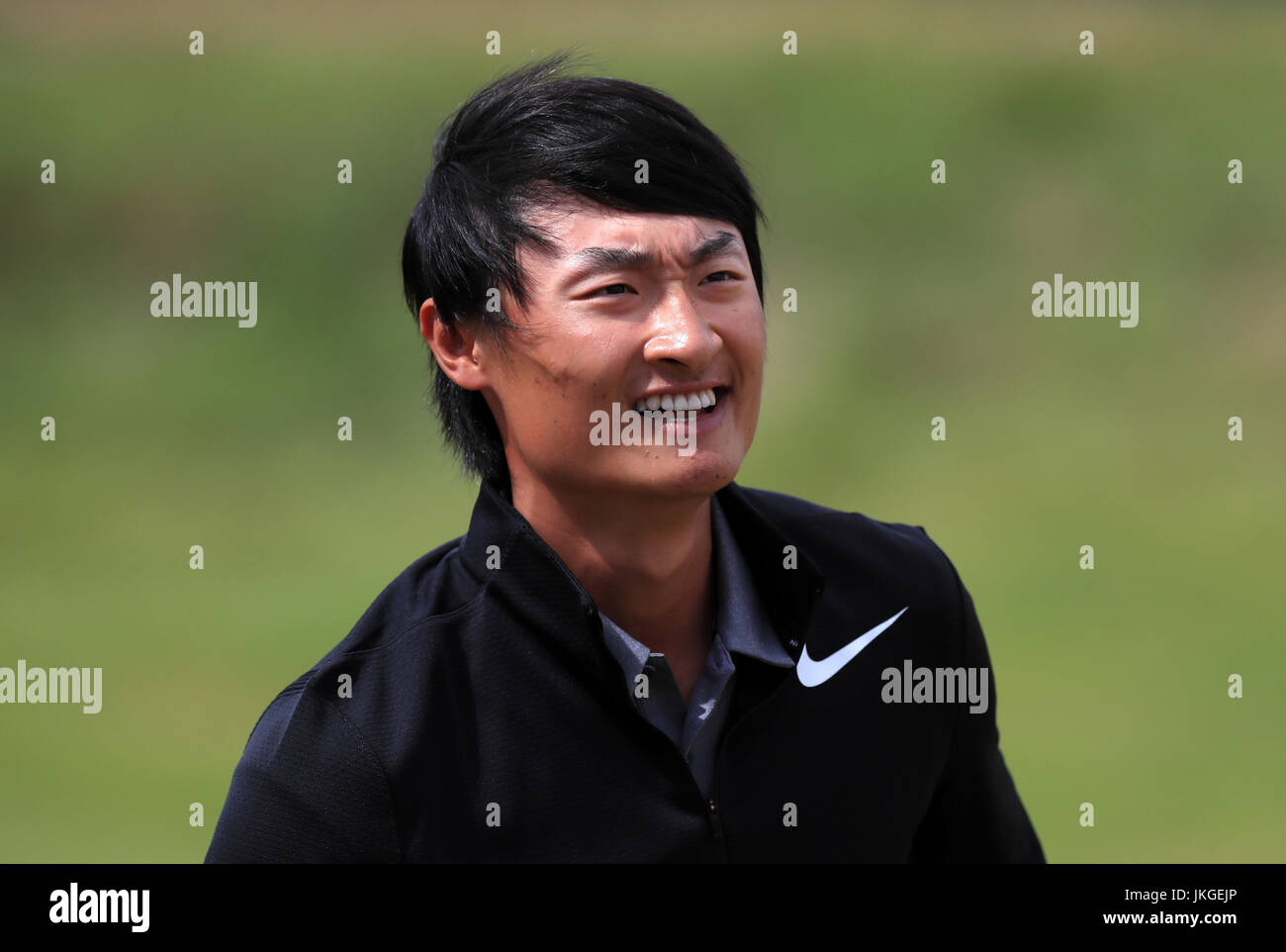 China's Li Haotong celebrates on the 18th during day four of The Open ...
