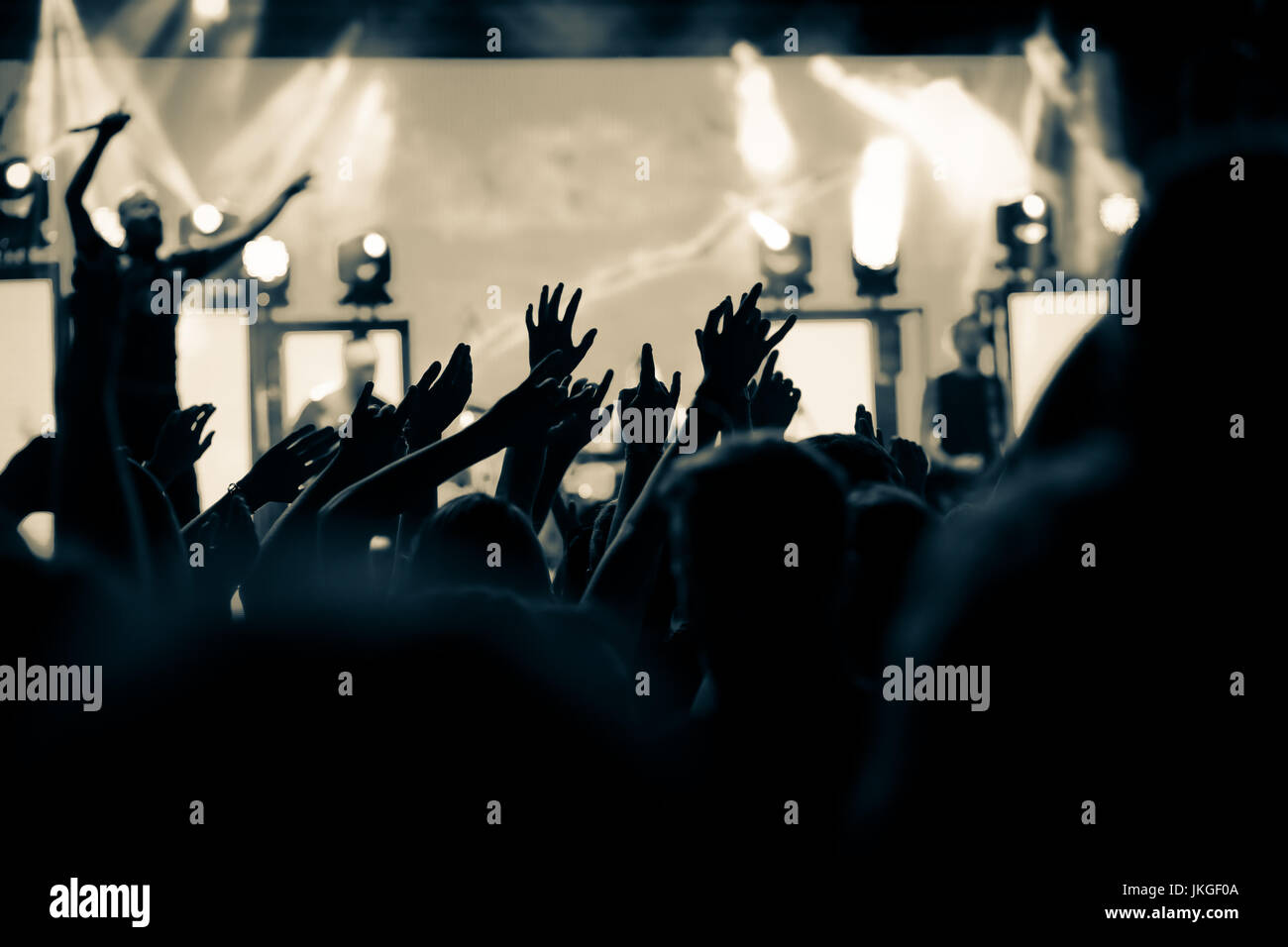 crowd with raised hands at concert - summer music festival Stock Photo ...