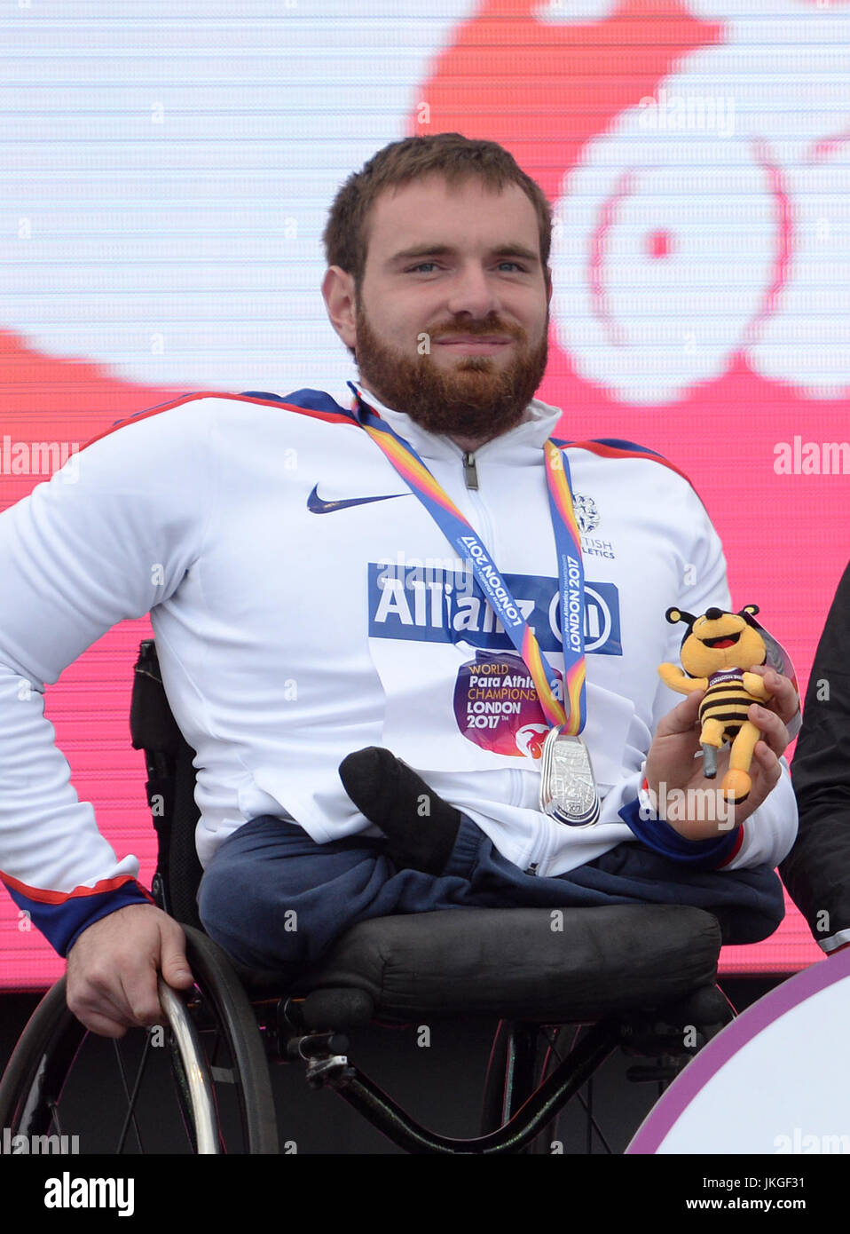 Great Britain's Mickey Bushell with his silver medal in the Men's 100m ...