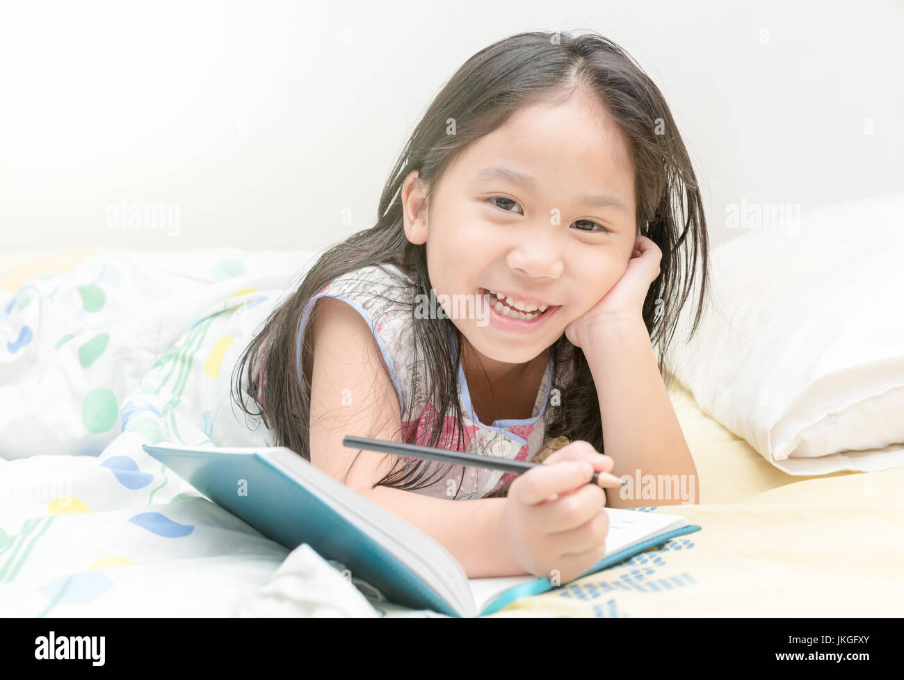 Beautiful asian girl studying home hi-res stock photography and images ...