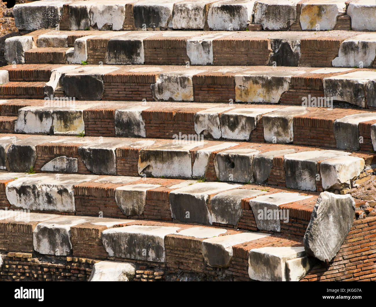 Square view of the preserved marble seating inside the Colosseum in ...