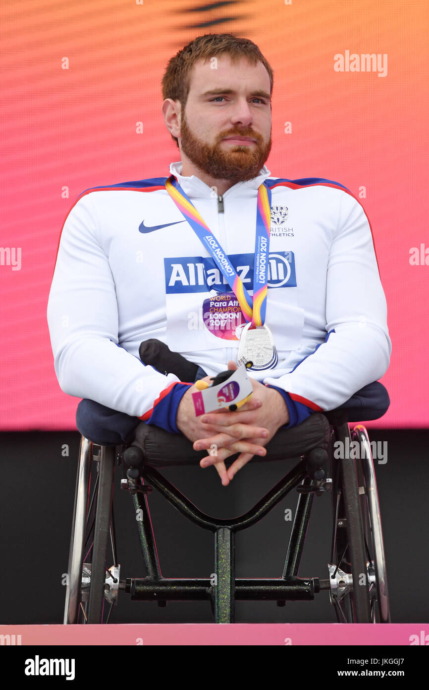 Great Britain's Mickey Bushell with his silver medal in the Men's 100m ...