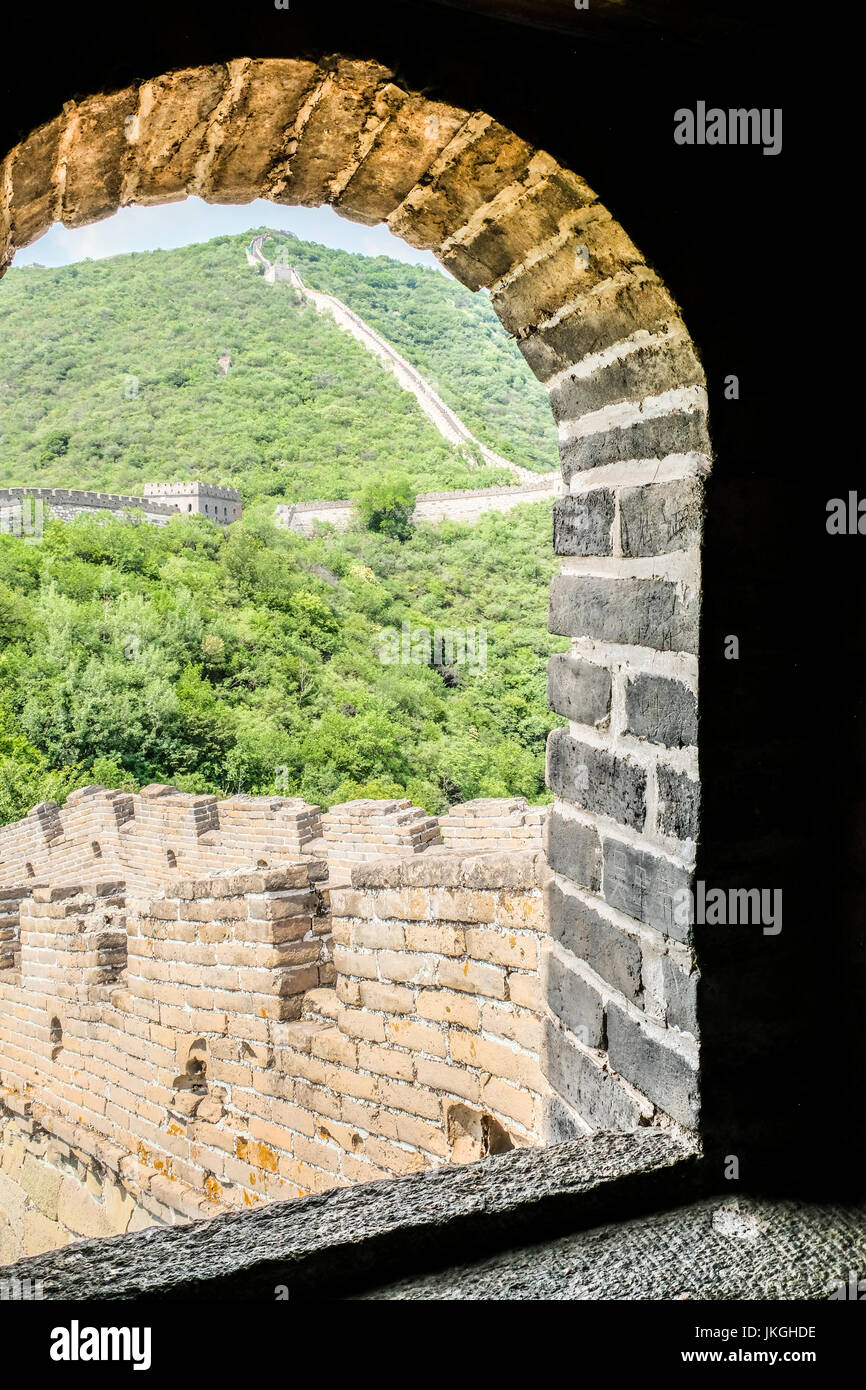 The Great Wall of China seen through a opening from within a guard ...