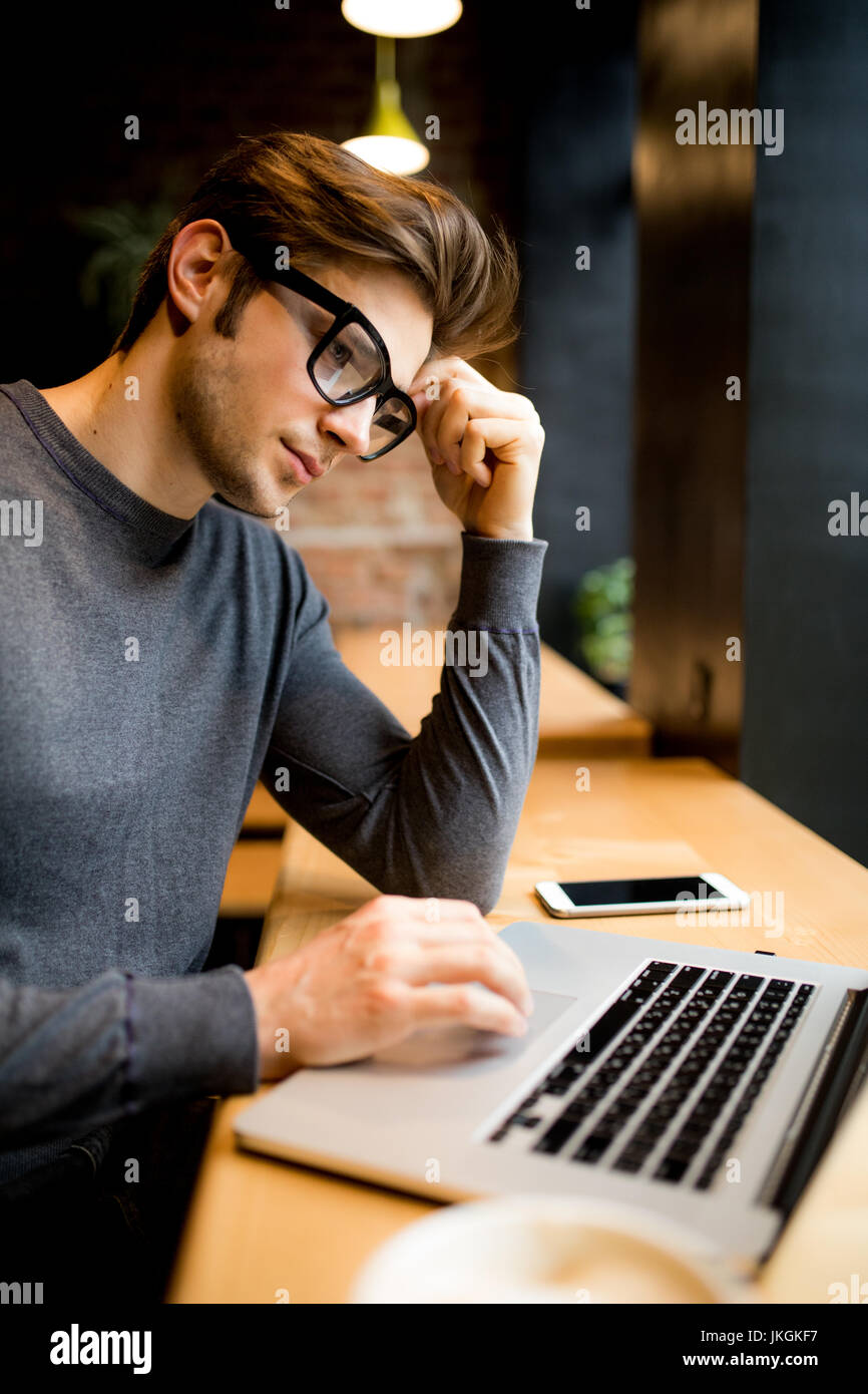 Confused businessman in front of computer hi-res stock photography and ...