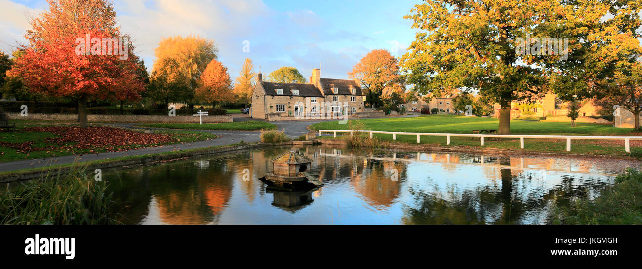 Autumn colours over the village green at Barrowden village, Rutland ...