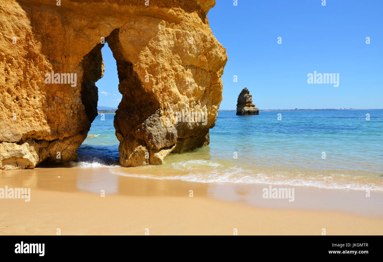 Famous gap between rocks at Camilo Beach (Praia do Camilo) at Algarve ...