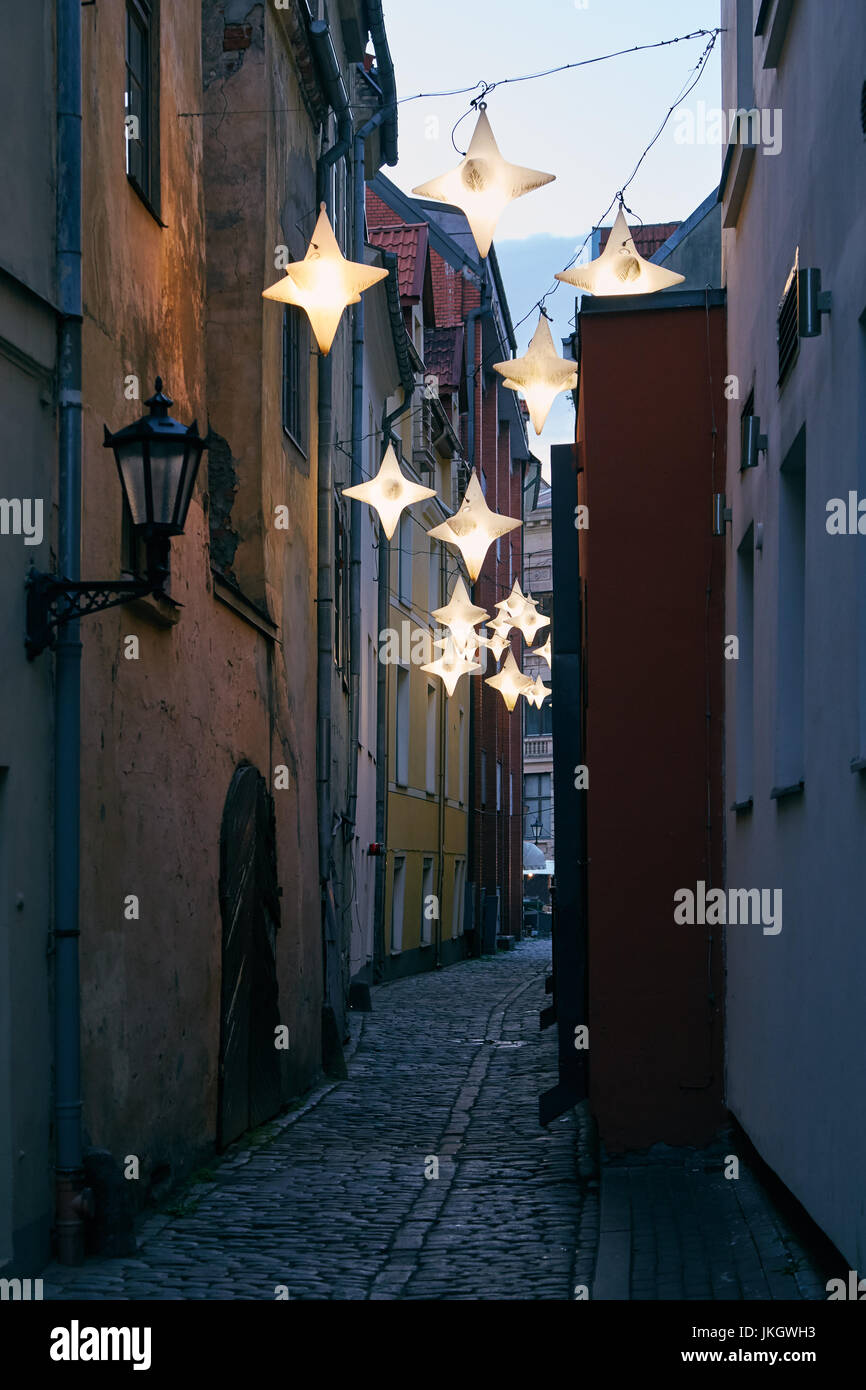 Narrow street lit streetlights hi-res stock photography and images - Alamy