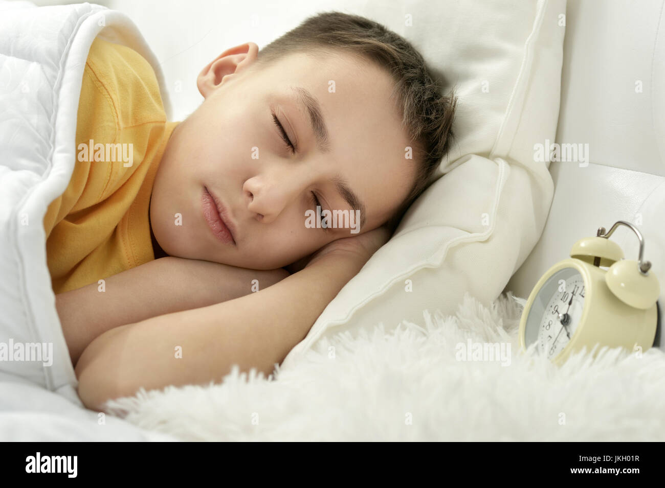 Portrait of a sleeping boy in room Stock Photo - Alamy