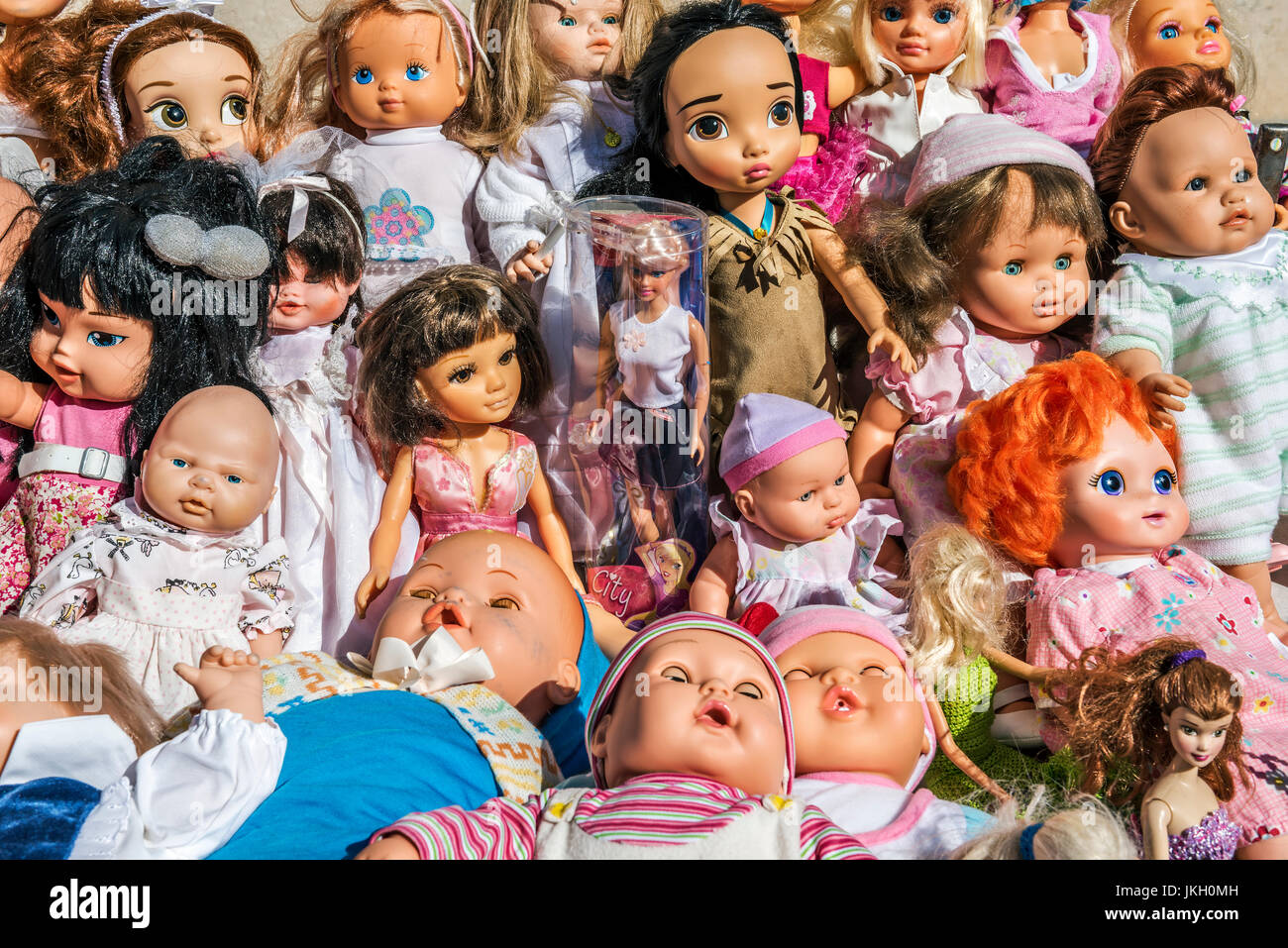 Toy dolls market stall in a flea market Stock Photo - Alamy