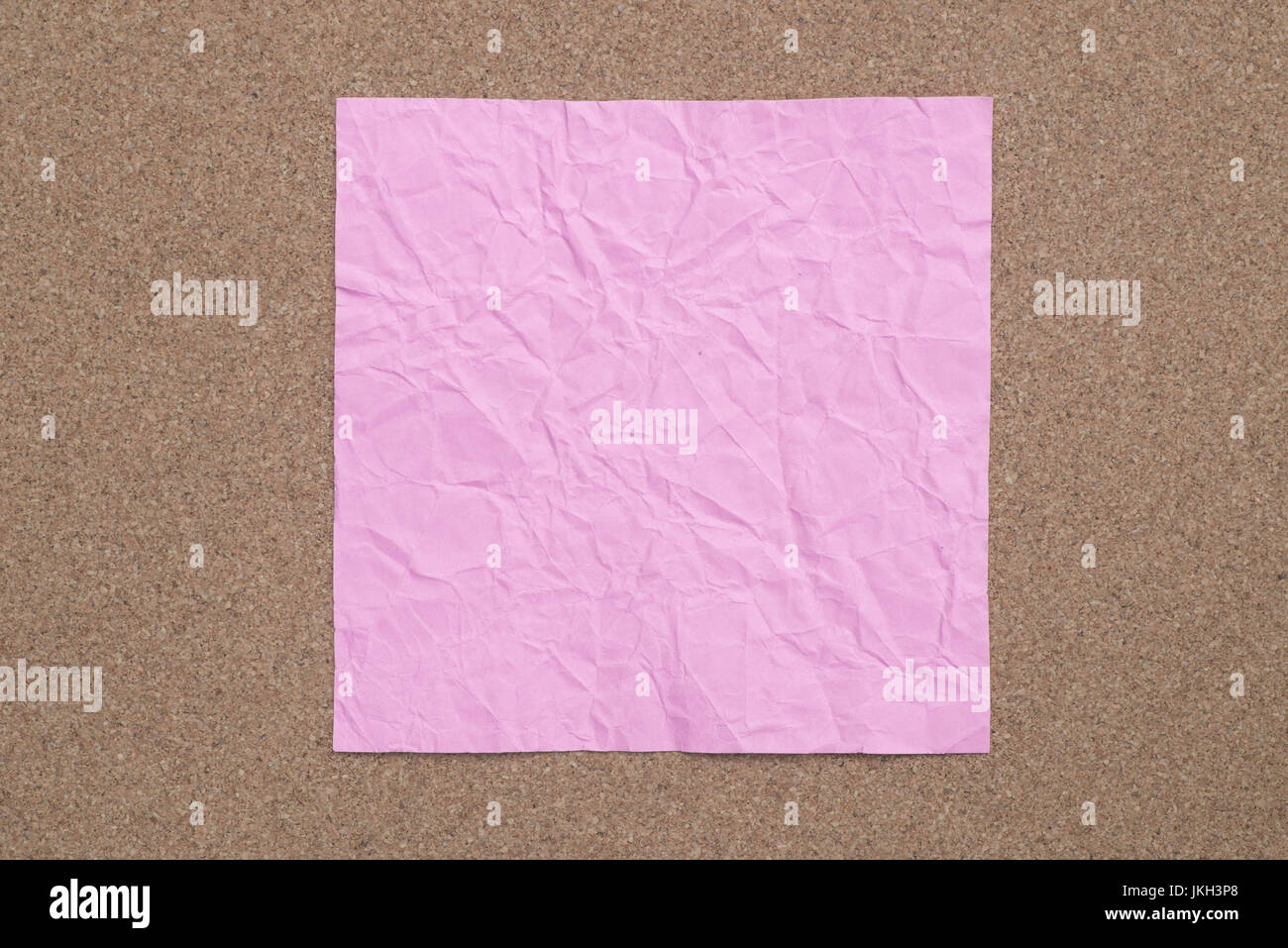 pink color creased paper note on cork background Stock Photo - Alamy