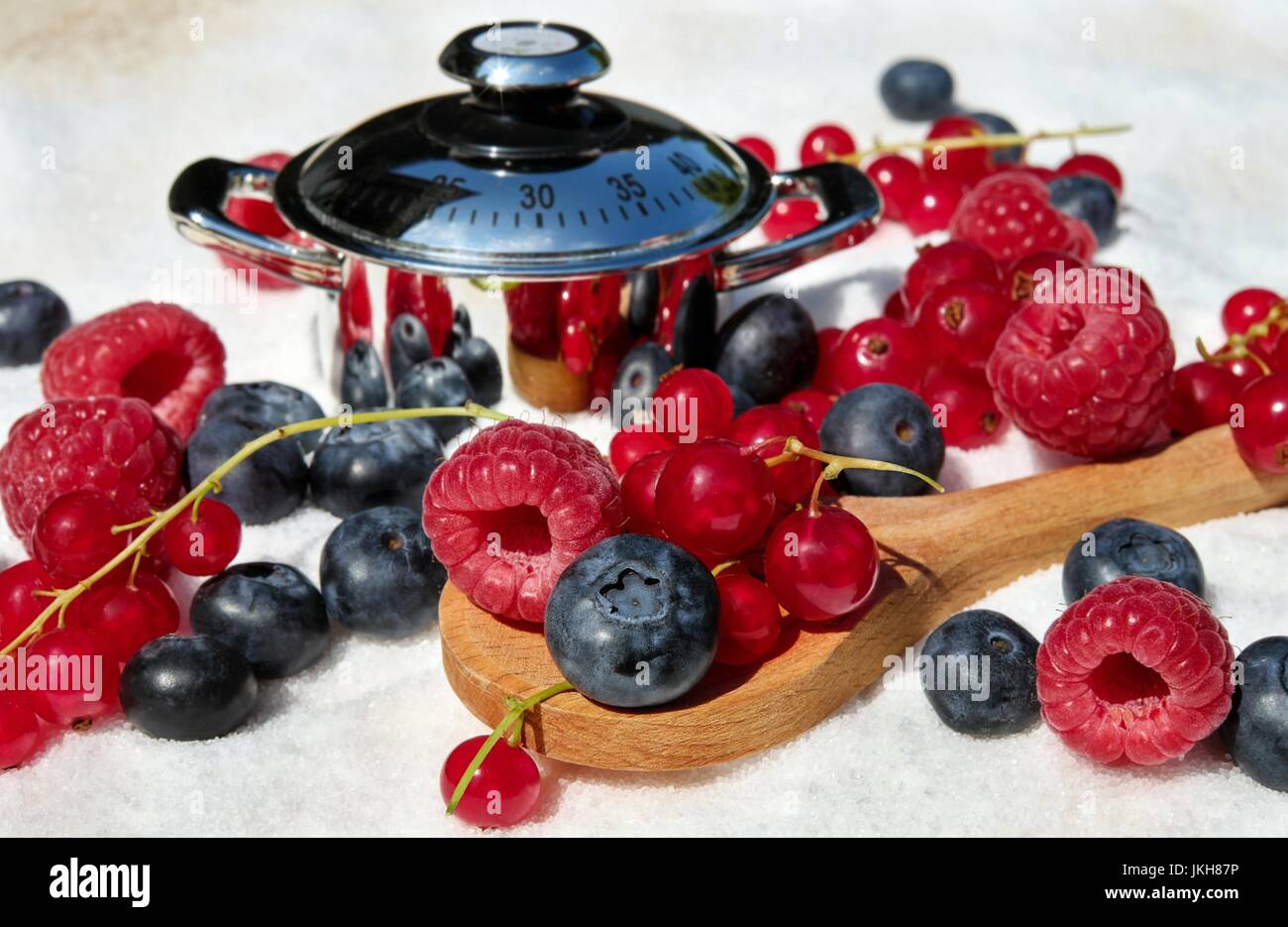 Beer, lime and berries Stock Photo - Alamy